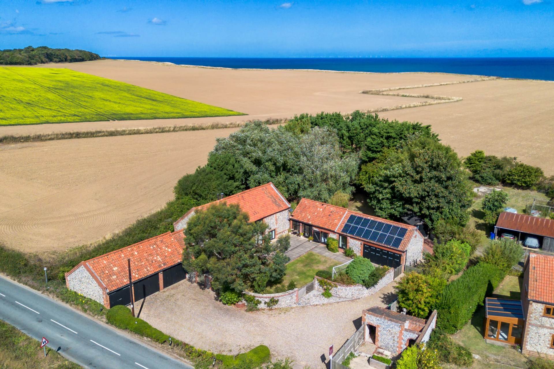 A captivating brick and flint barn conversion with independent annex ...